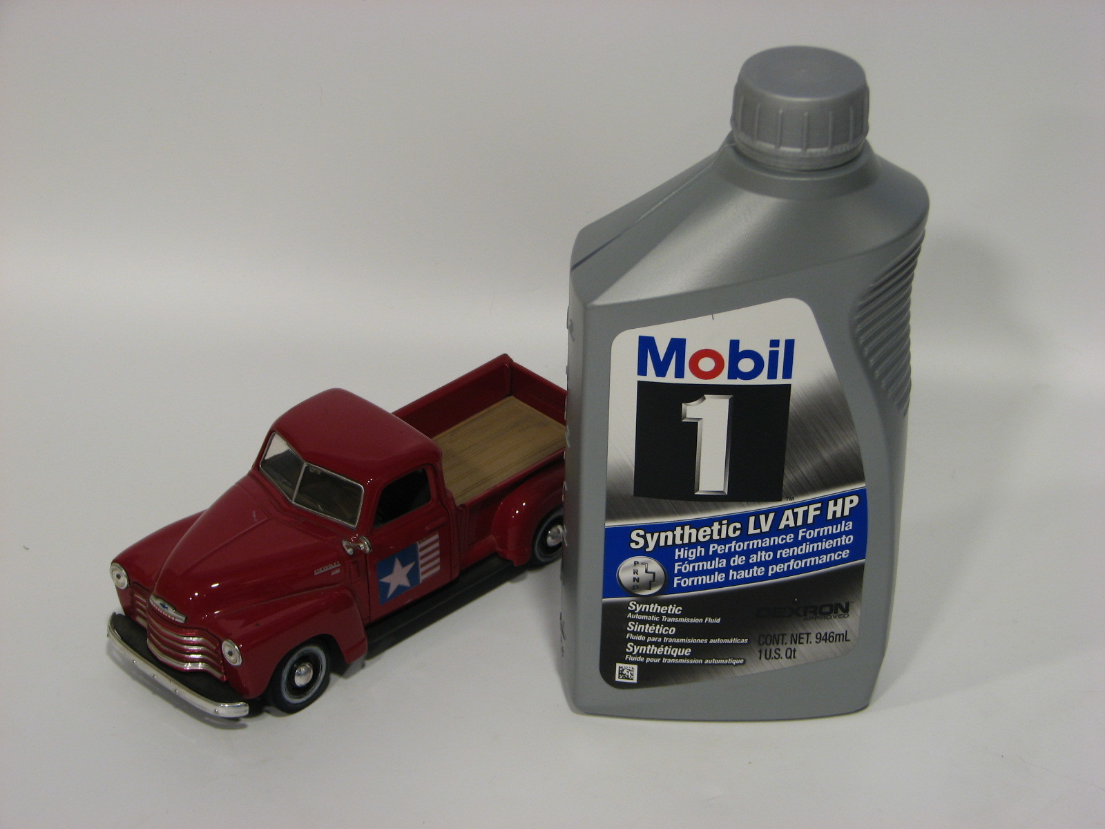 Трансмисионно масло - Mobil1 Dexron LV HP- 124715 -1us qt/32FL/OZ/ 946мл.